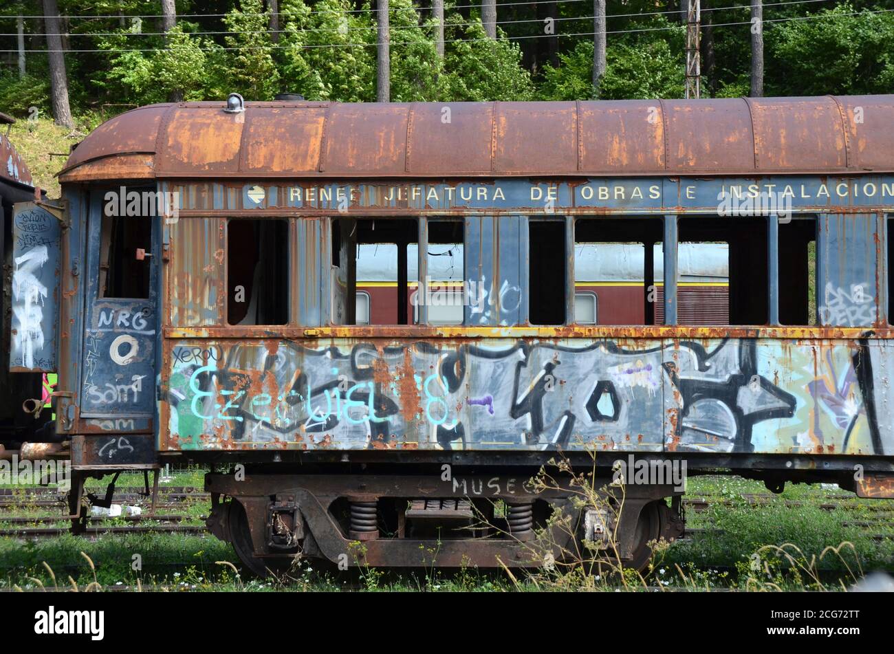 Old railway cars from the spanish RENFE abandoned in the station of ...