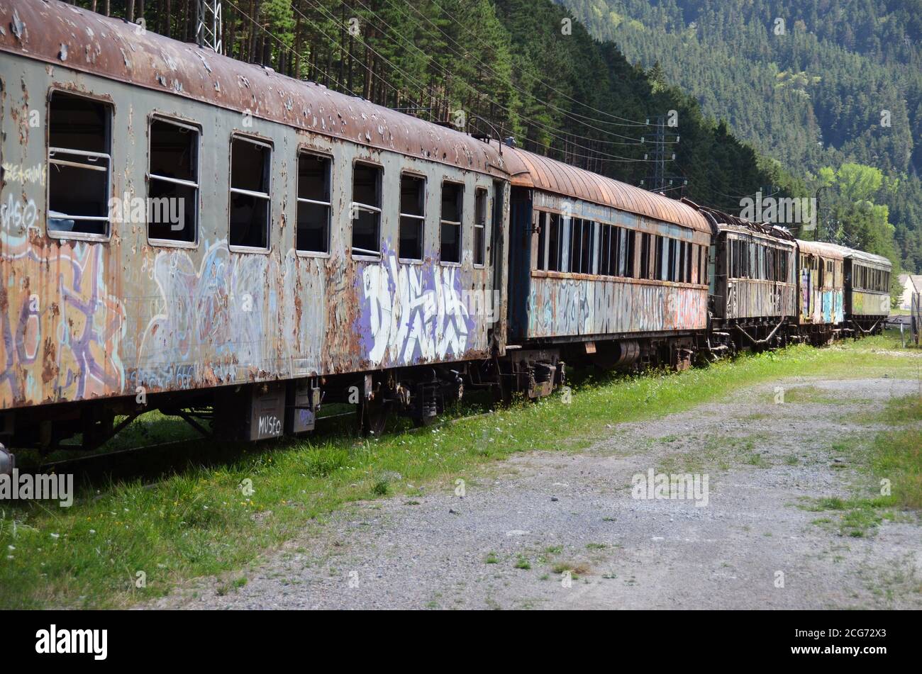 Old railway cars from the spanish RENFE abandoned in the station of ...