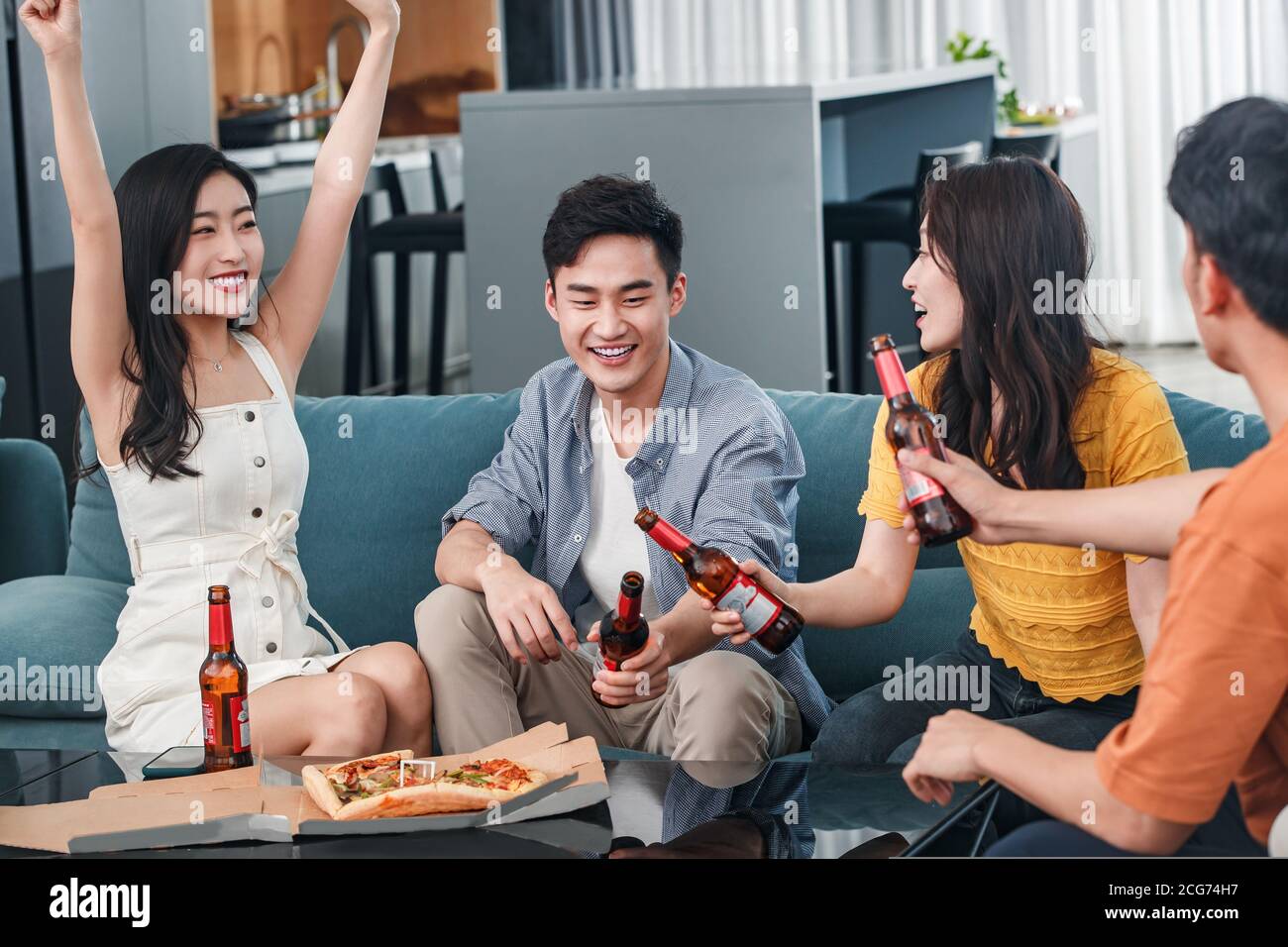 Happy young friends dinner party Stock Photo - Alamy