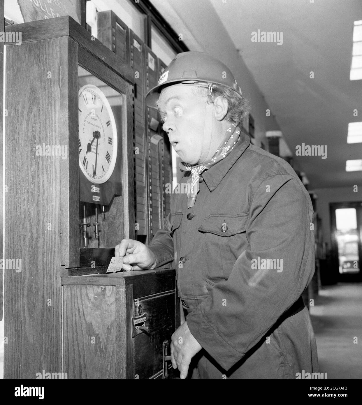 Comedian Charlie Drake clocks in for his latest comedy Mister Ten Per ...