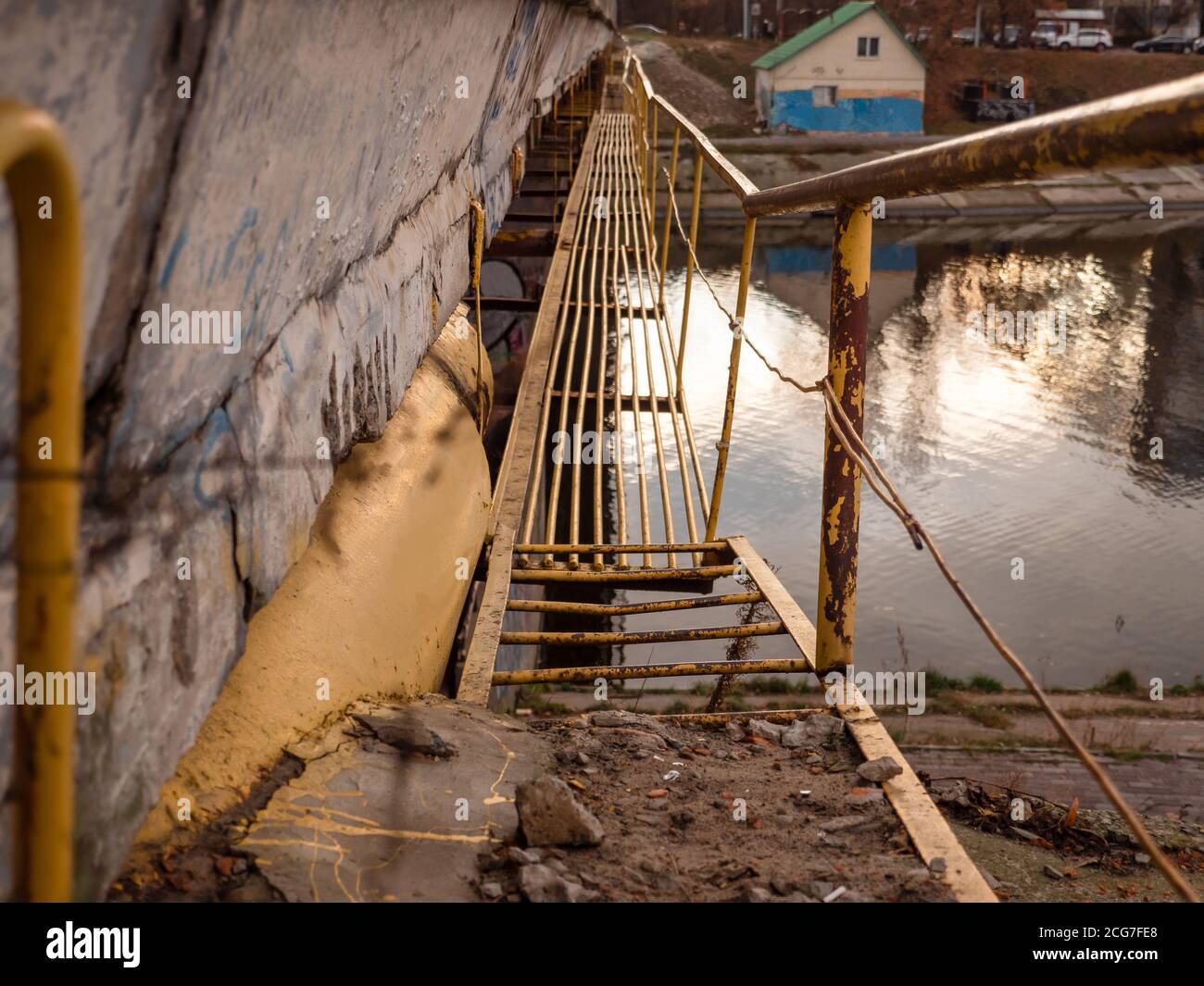 Narrow technical bridge with metal bars for the maintenance of a big ...