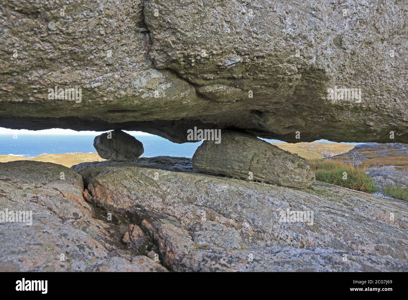 View of the small rocks holding up the Queen's Stone on the top of Ben ...