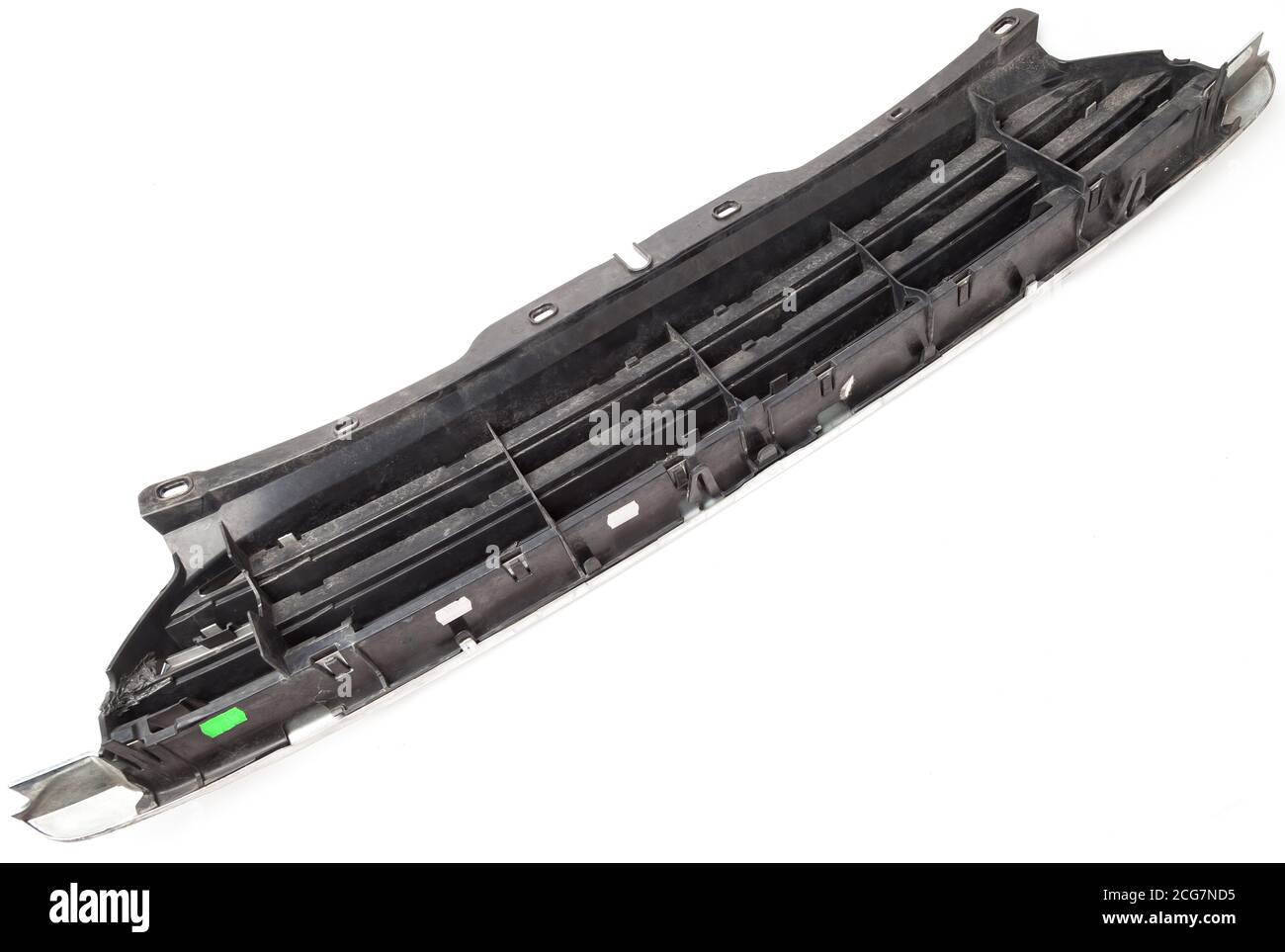 Radiator grill on back of black plastic on white background in photo ...