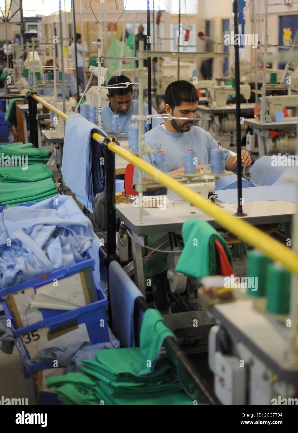 Inmates sew during a workshop at Pentonville Prison, London Stock Photo ...