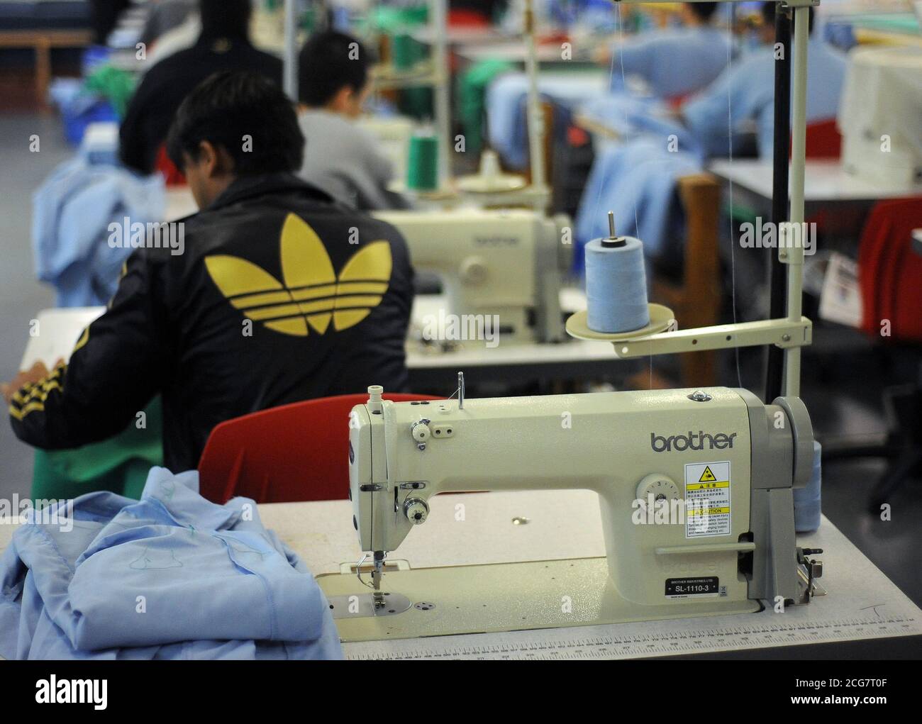 Inmates sew during a workshop at Pentonville Prison, London Stock Photo ...
