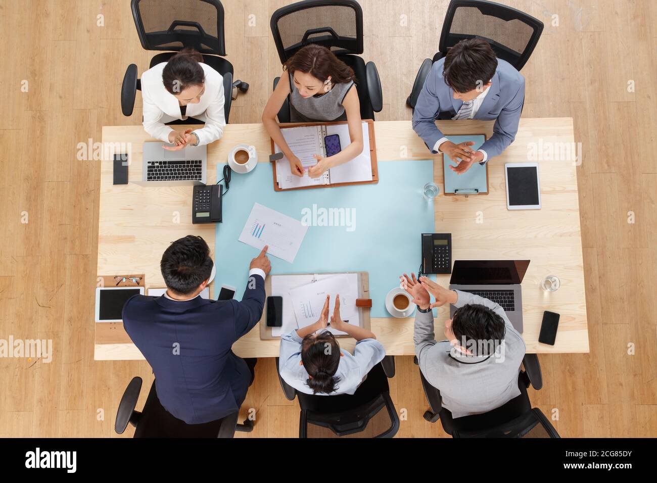 Business team meeting in indoor Stock Photo - Alamy