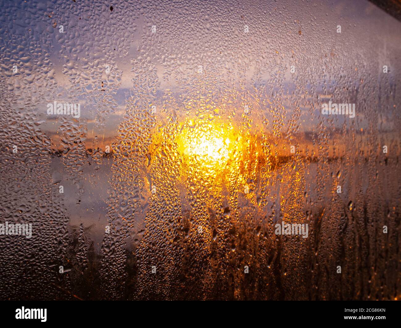 frosty window sunrise glow Stock Photo - Alamy