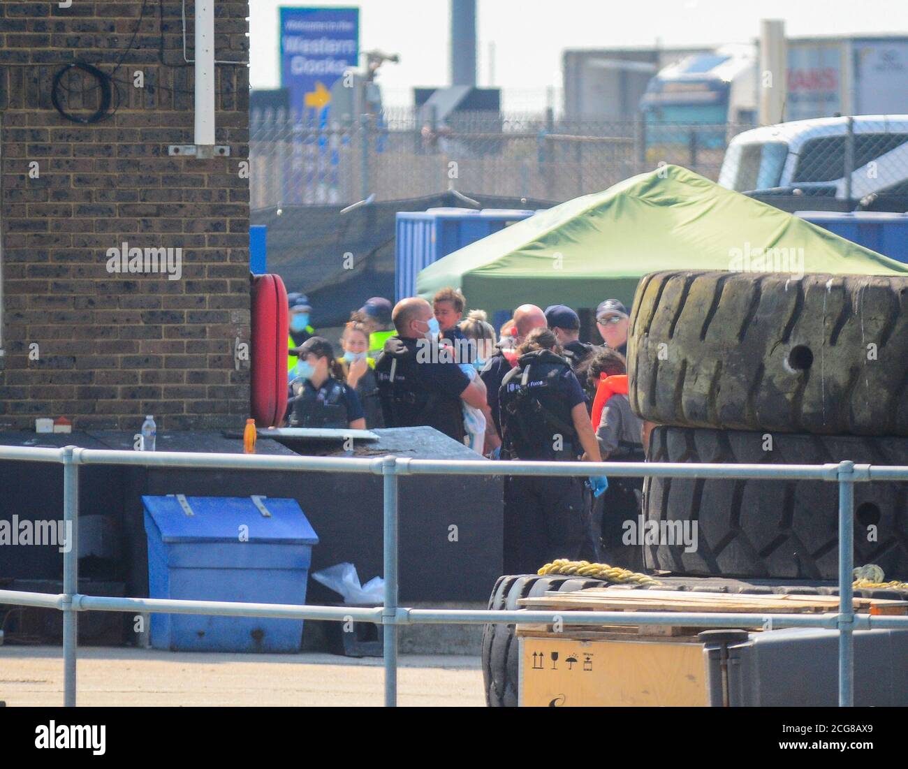 The UK Border Force apprehends a large group of suspected illegal ...
