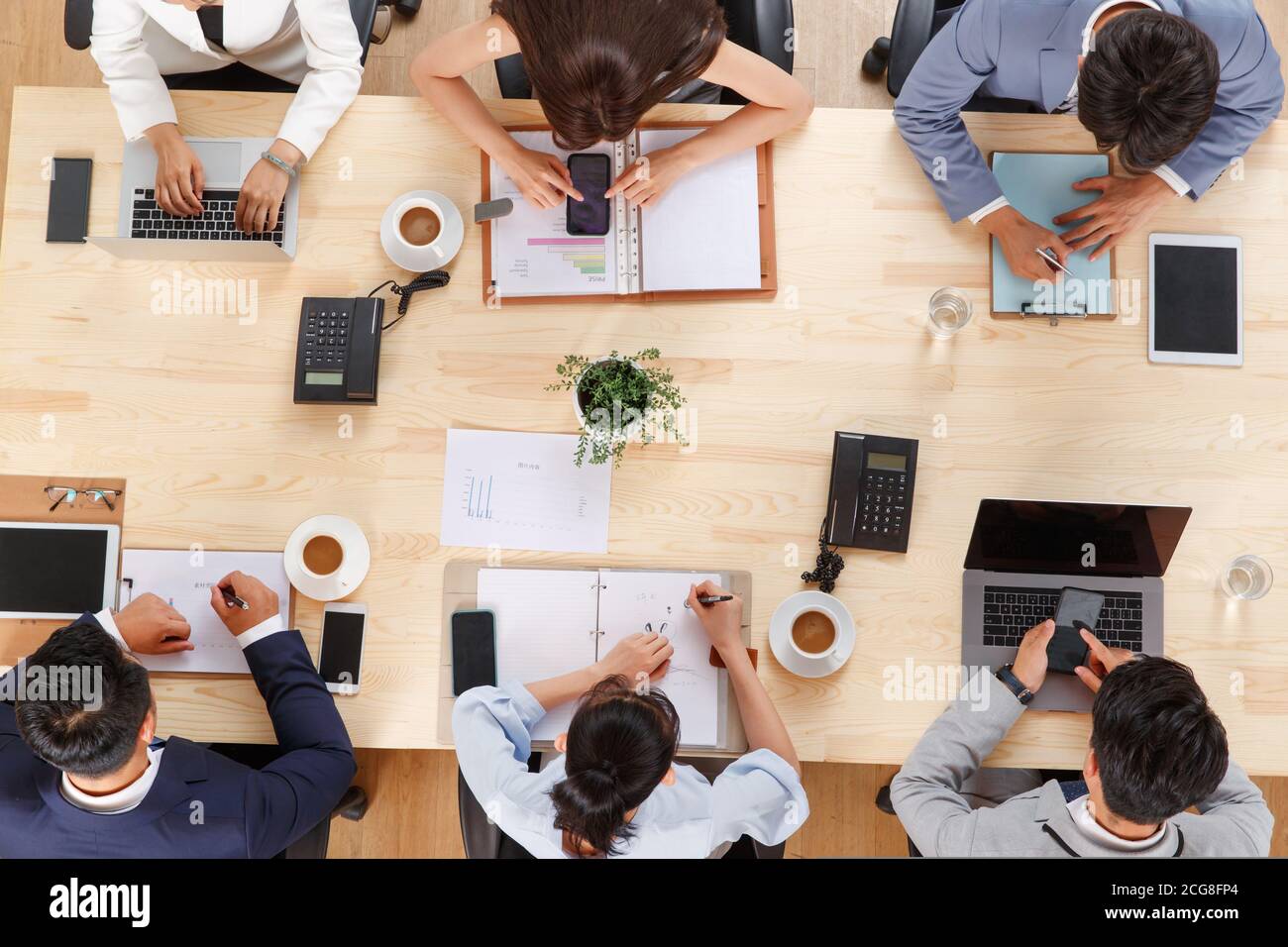 Business team meeting in indoor Stock Photo - Alamy
