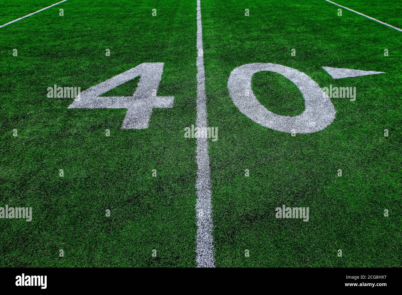 Football field green grass white yard markers to touchdown competition ...