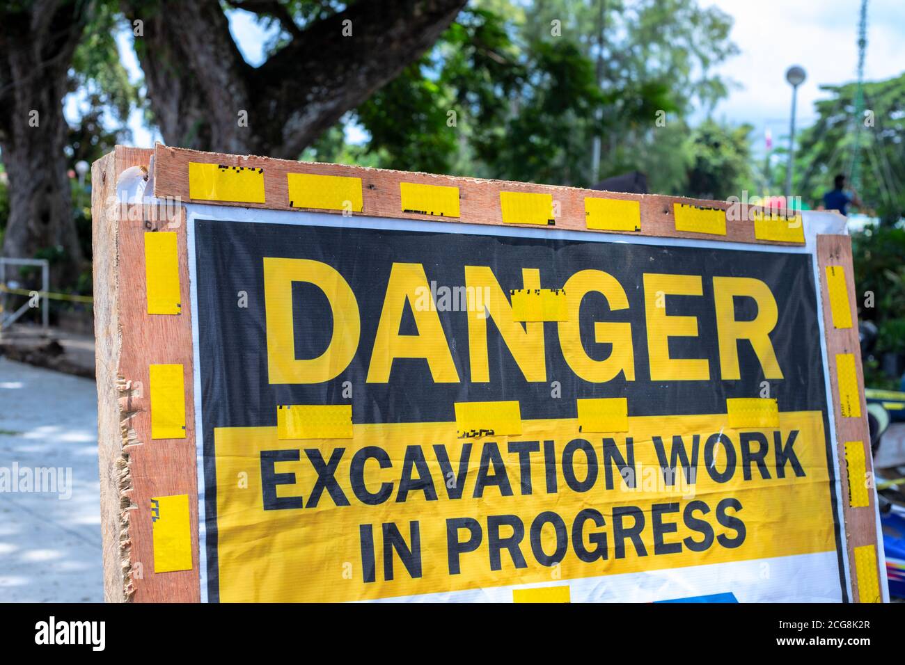 Danger roadsign with yellow and black colors. Stop sign closeup on ...