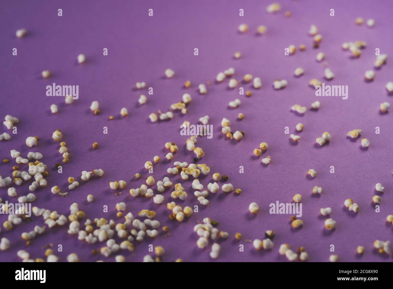 Organic Amaranth seeds over a purple background Stock Photo - Alamy