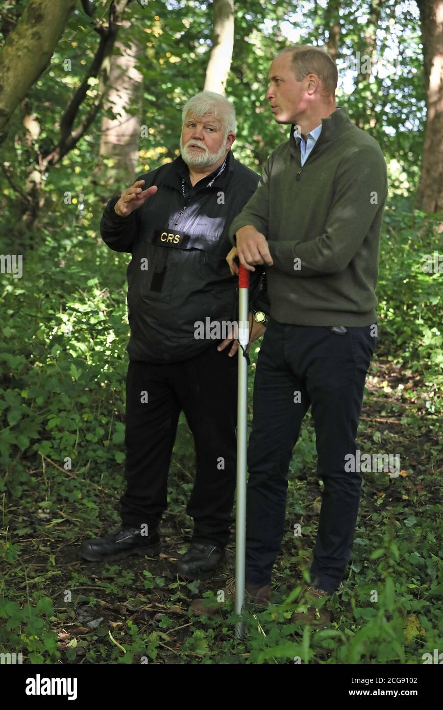 The Duke of Cambridge (right)speaks with Community Rescue Service (CRS ...