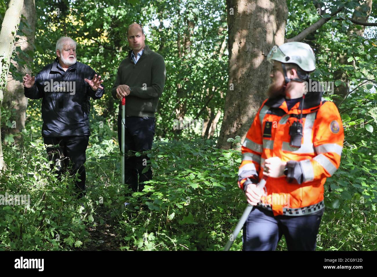 The Duke of Cambridge (centre)speaks with Community Rescue Service (CRS ...
