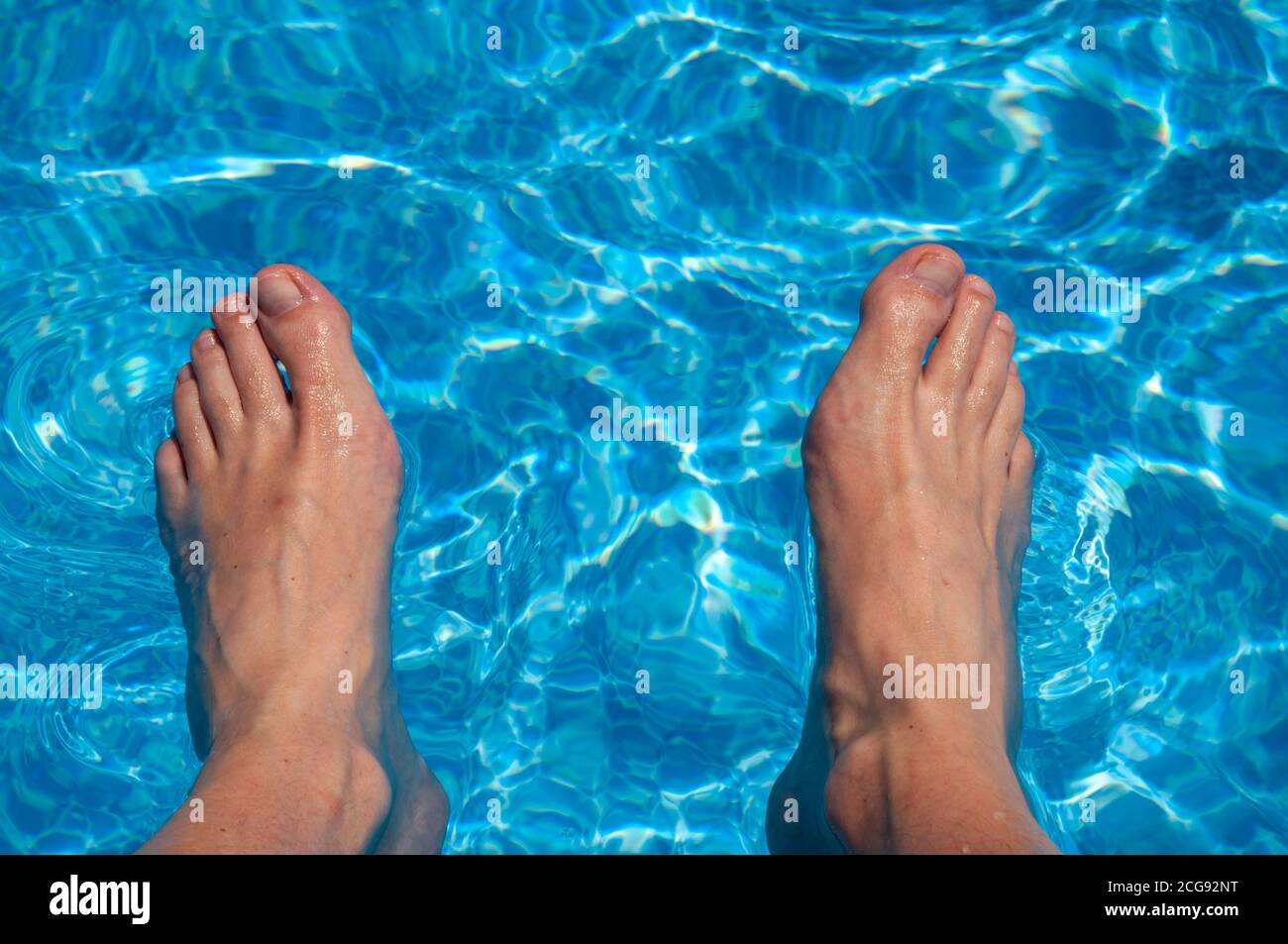 Legs dangling hi-res stock photography and images - Alamy