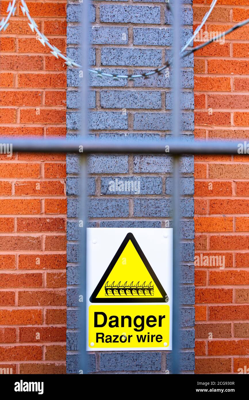 Razor wire fence wall hi-res stock photography and images - Alamy