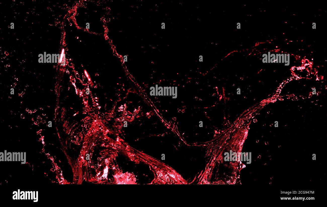 Abstract red wine splash shape on black background. Bavaragers and ...