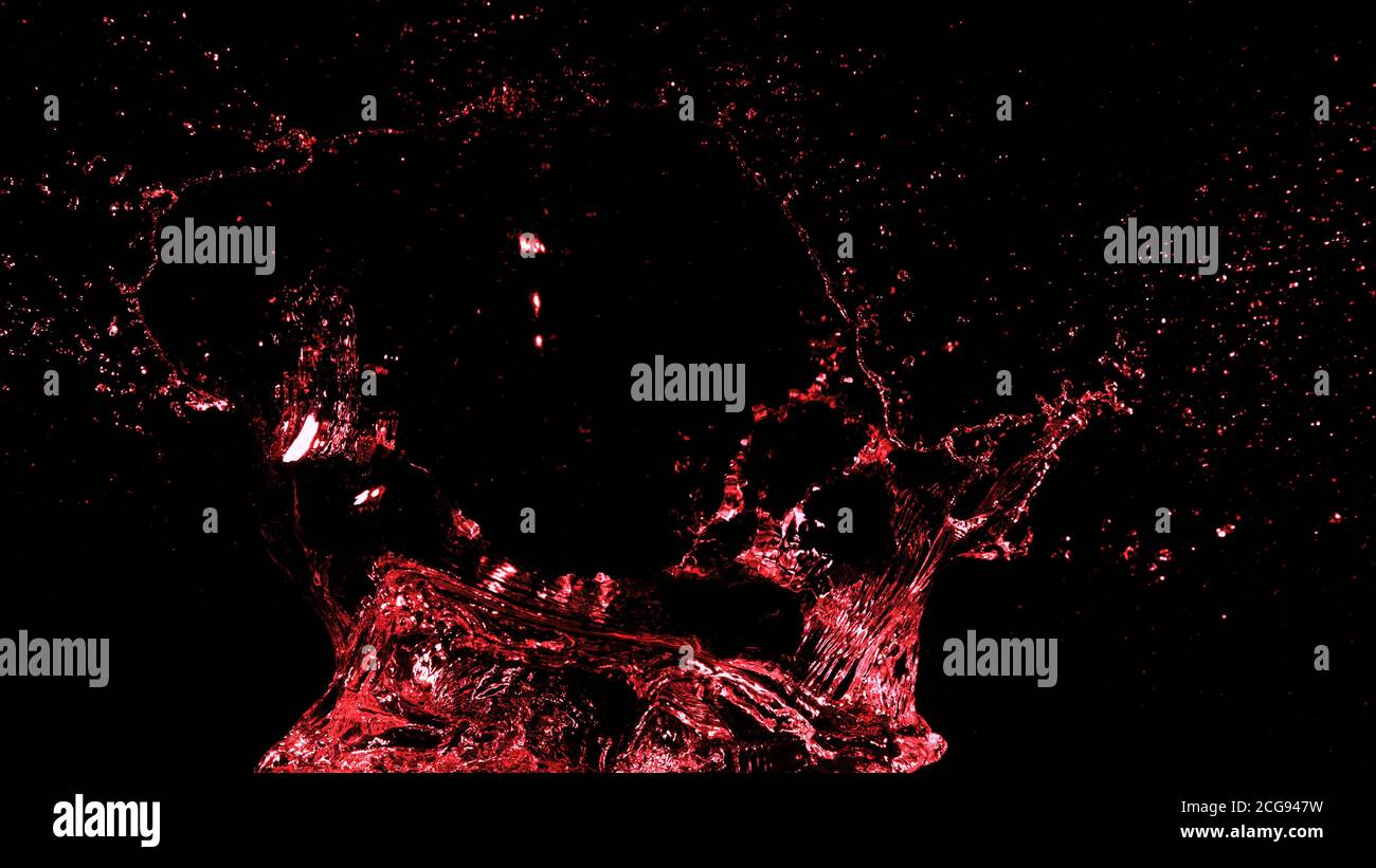 Abstract red wine splash shape on black background. Bavaragers and ...