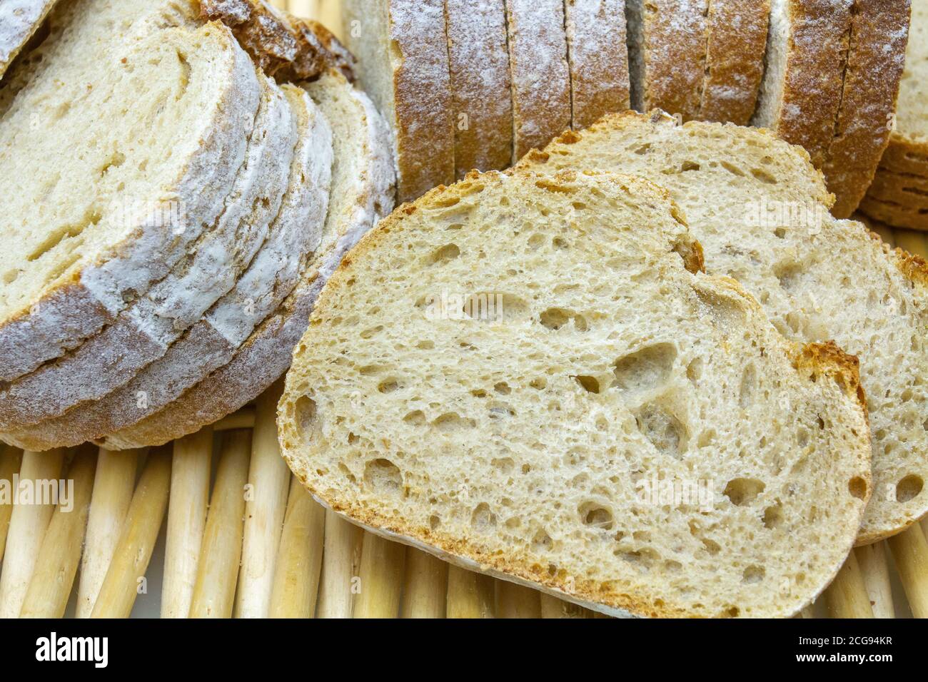 country bread sliced on a table Stock Photo - Alamy
