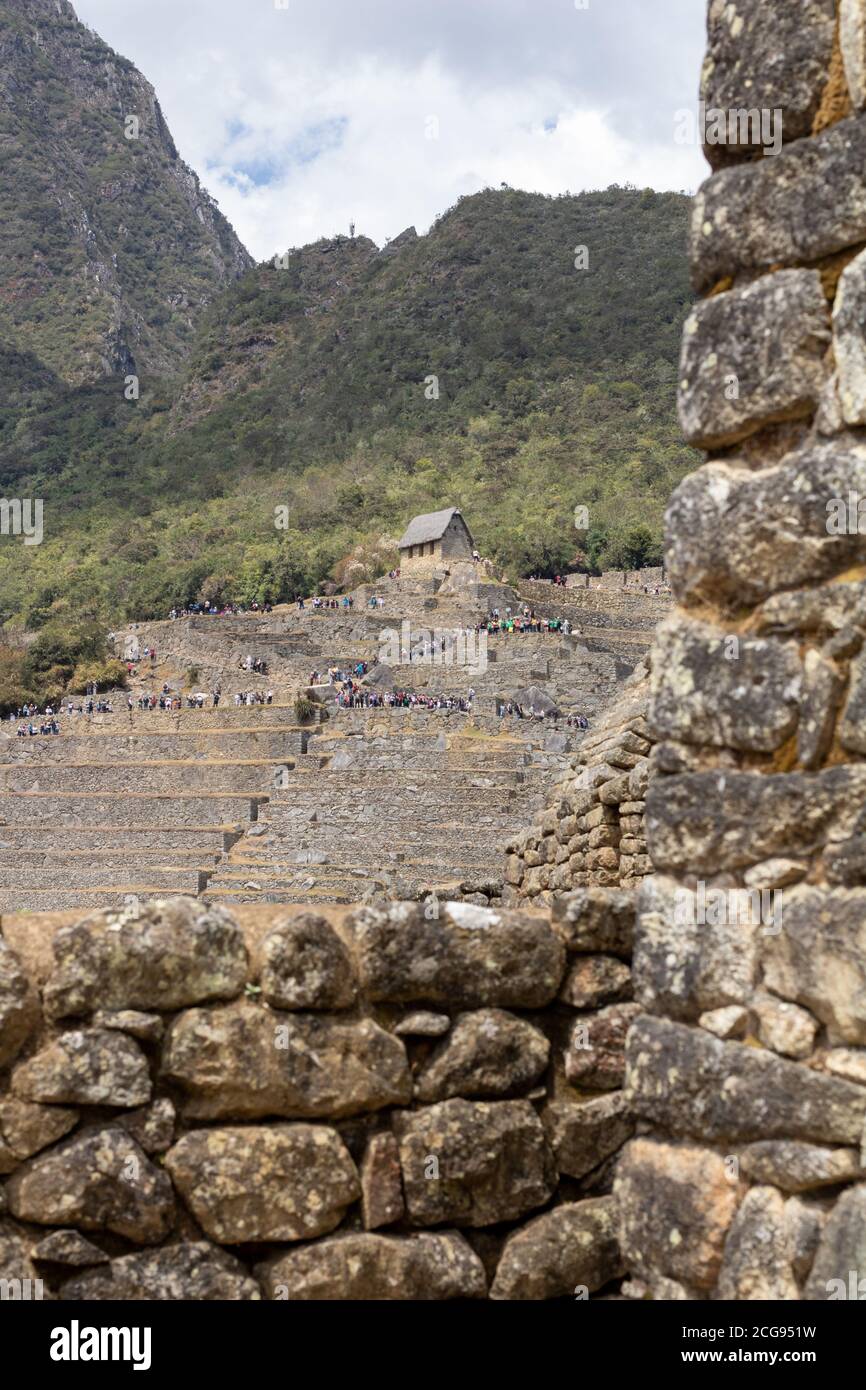 scenes from the ruins and the Inca city of Machu Picchu in central Peru ...