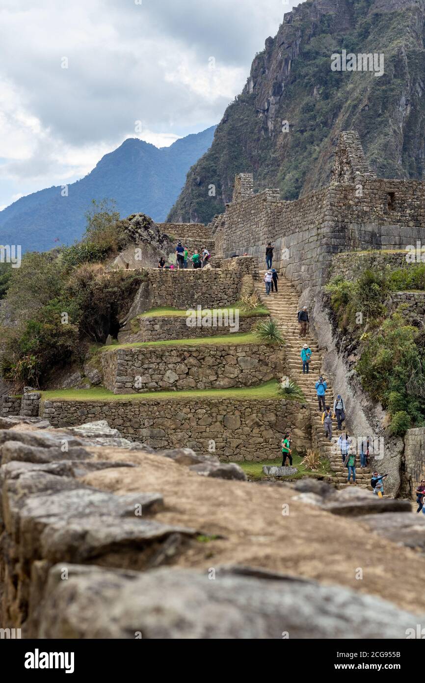 scenes from the ruins and the Inca city of Machu Picchu in central Peru ...