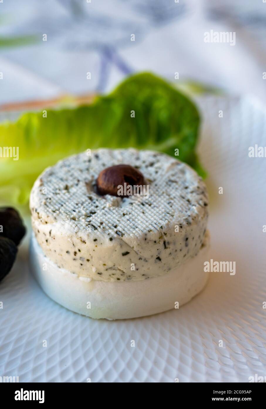 Cheese collection, French soft white goat cheese with aromatic herbs of ...