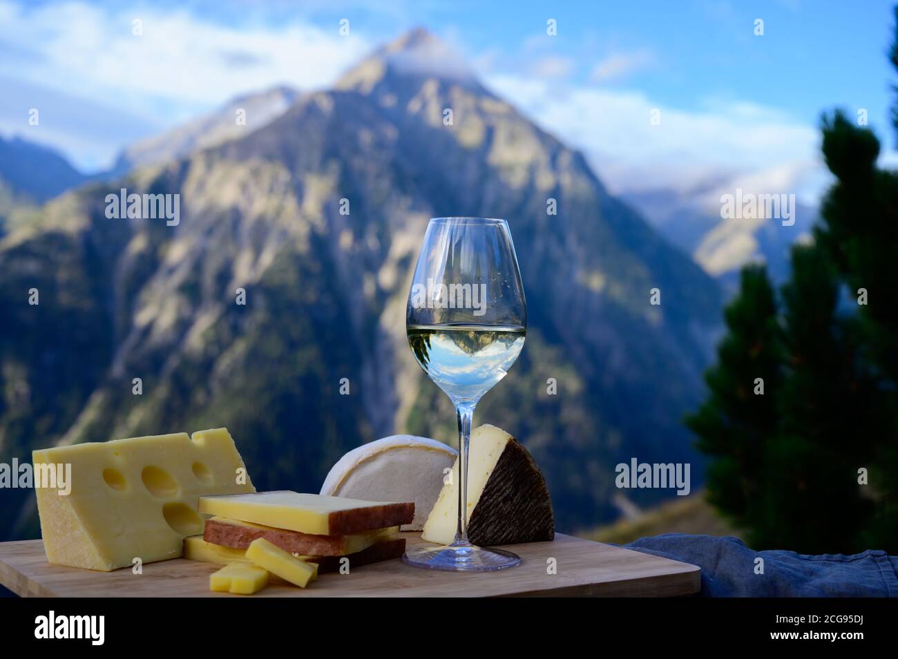 Tasty cheese and wine from Savoy region in France, beaufort, abondance ...