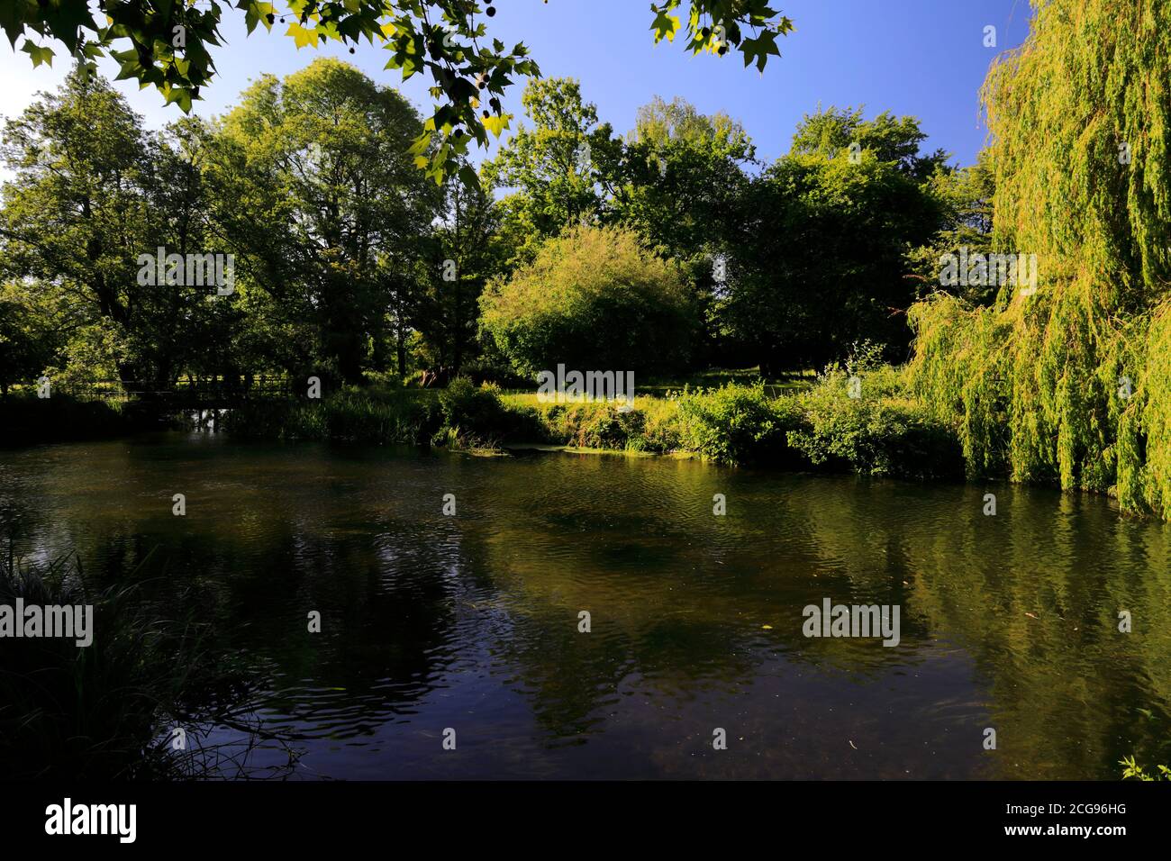 Summer view of the Little Ouse river, Brandon town, Norfolk, England ...