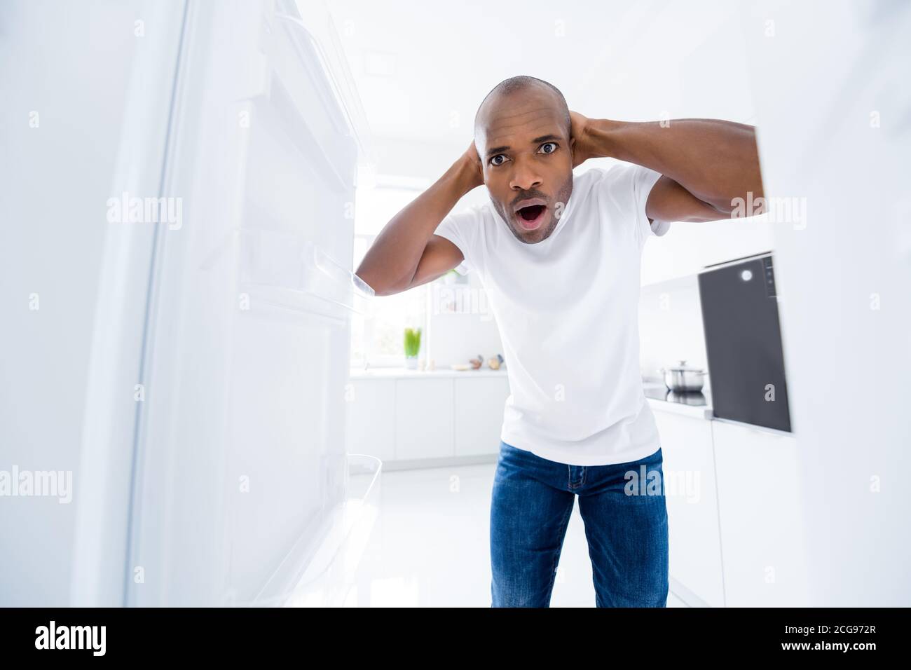 Shocked looking young man party hi-res stock photography and images - Alamy