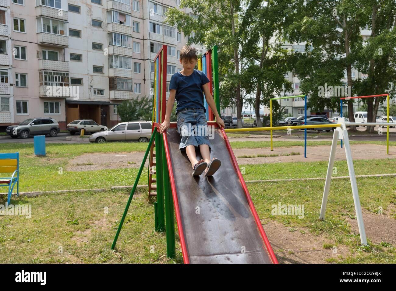 Going down the slide hi-res stock photography and images - Alamy