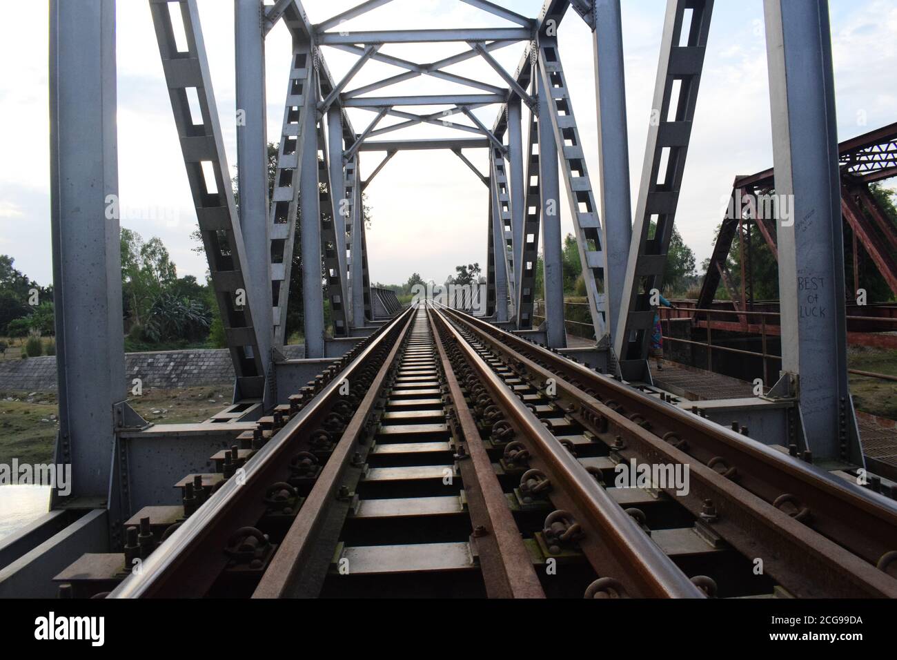 Iron made huge railway bridge with railway tracks Stock Photo - Alamy