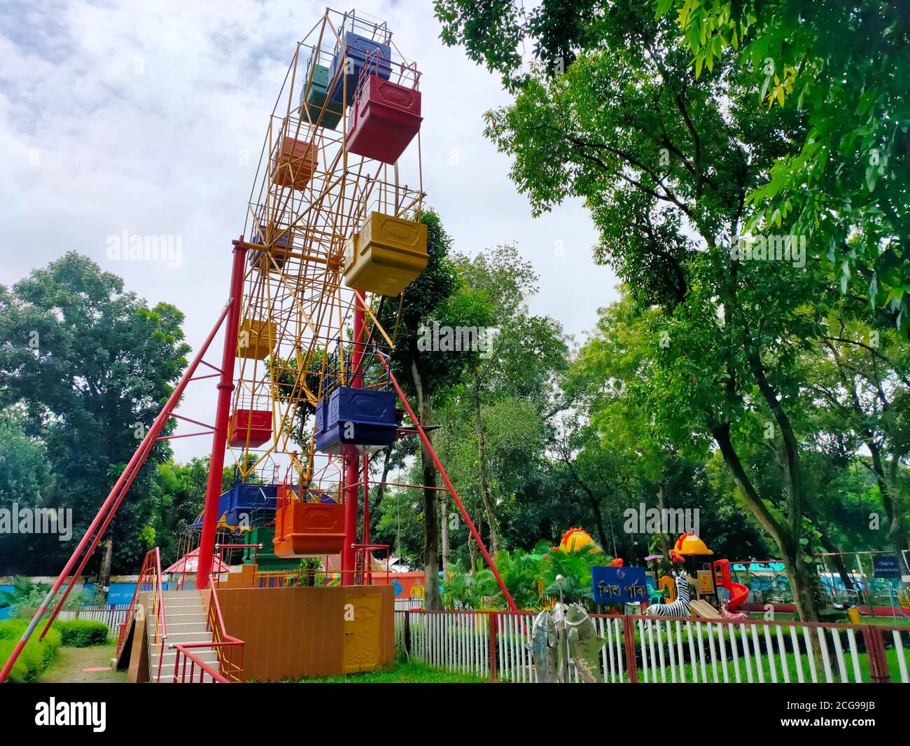 21 Aug 2020 Tangail, Bangladesh. Amusement park. Carousel, Ferris wheel ...