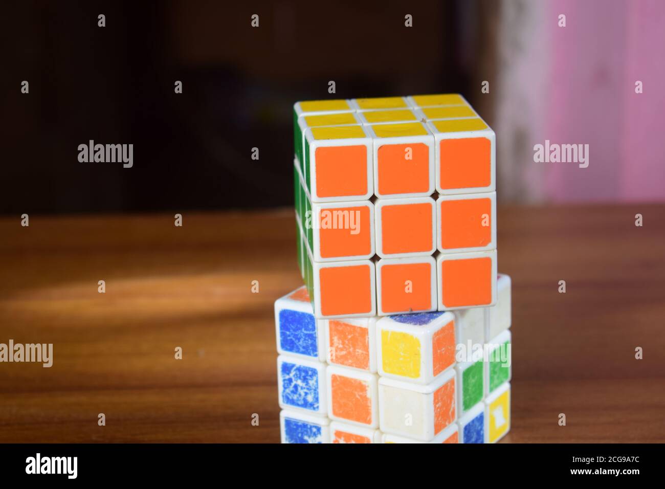 Rubik's cube solved and unsolved Stock Photo - Alamy