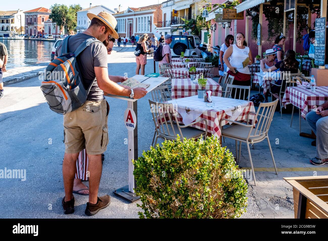 Group Looking At Menu Outside High Resolution Stock Photography and ...