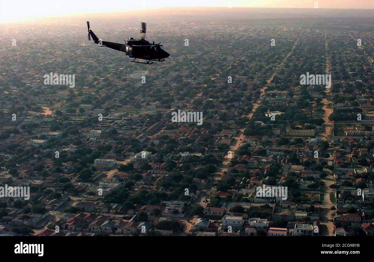 Aerial view, right side profile, of a US Marine UH-1N "Huey" helicopter ...
