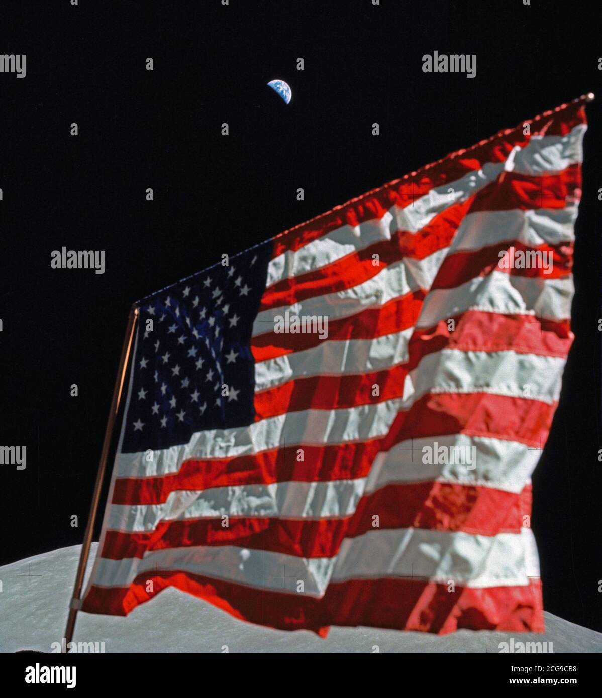 Astronaut in moon with u s flag hi-res stock photography and images - Alamy