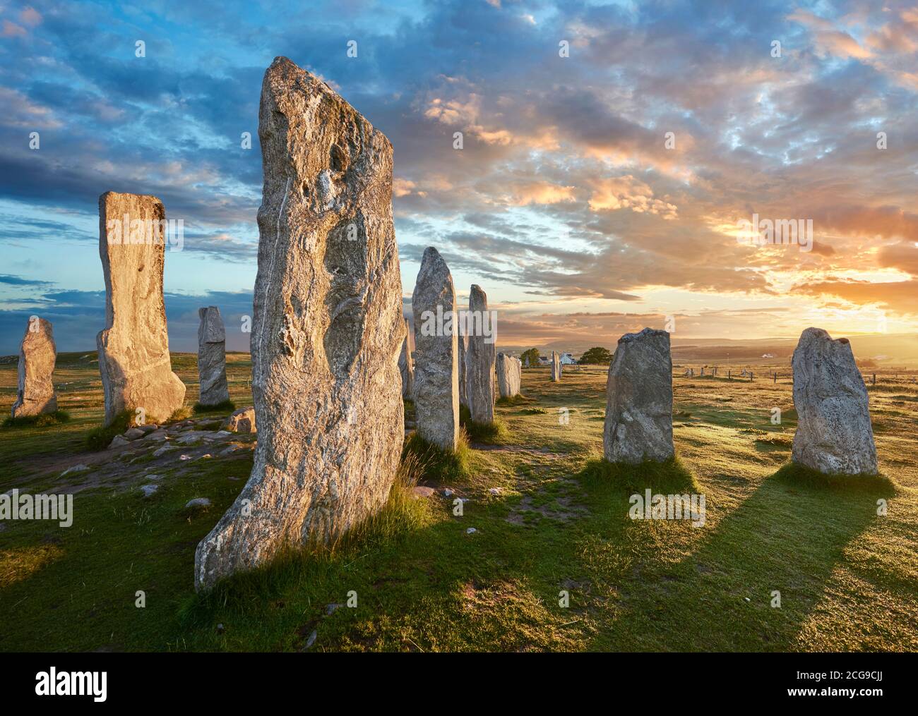 Calanais Standing Stones central stone, at sunset, circle erected ...
