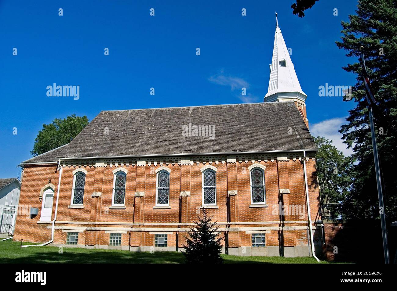 The church shines in the afternoon sun on a summer's day in Spring ...