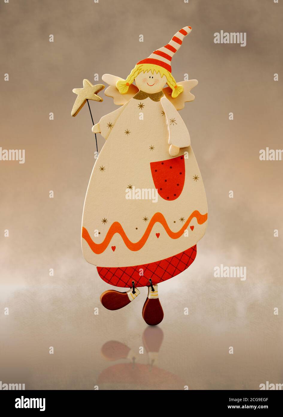 Hand made artisan wooden angel tree decoration, , cut out Stock Photo ...