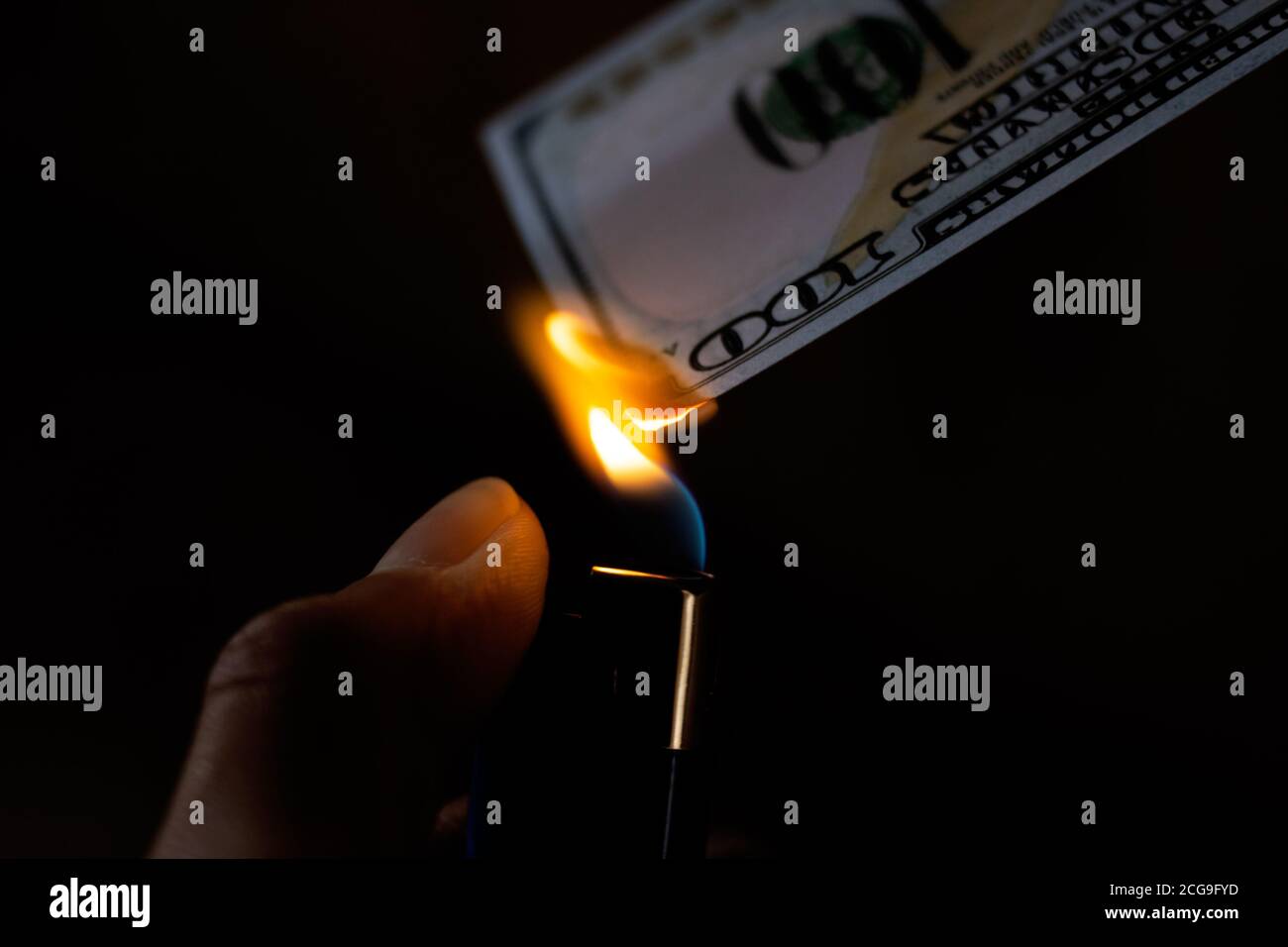 Burn money with lighter hi-res stock photography and images - Alamy