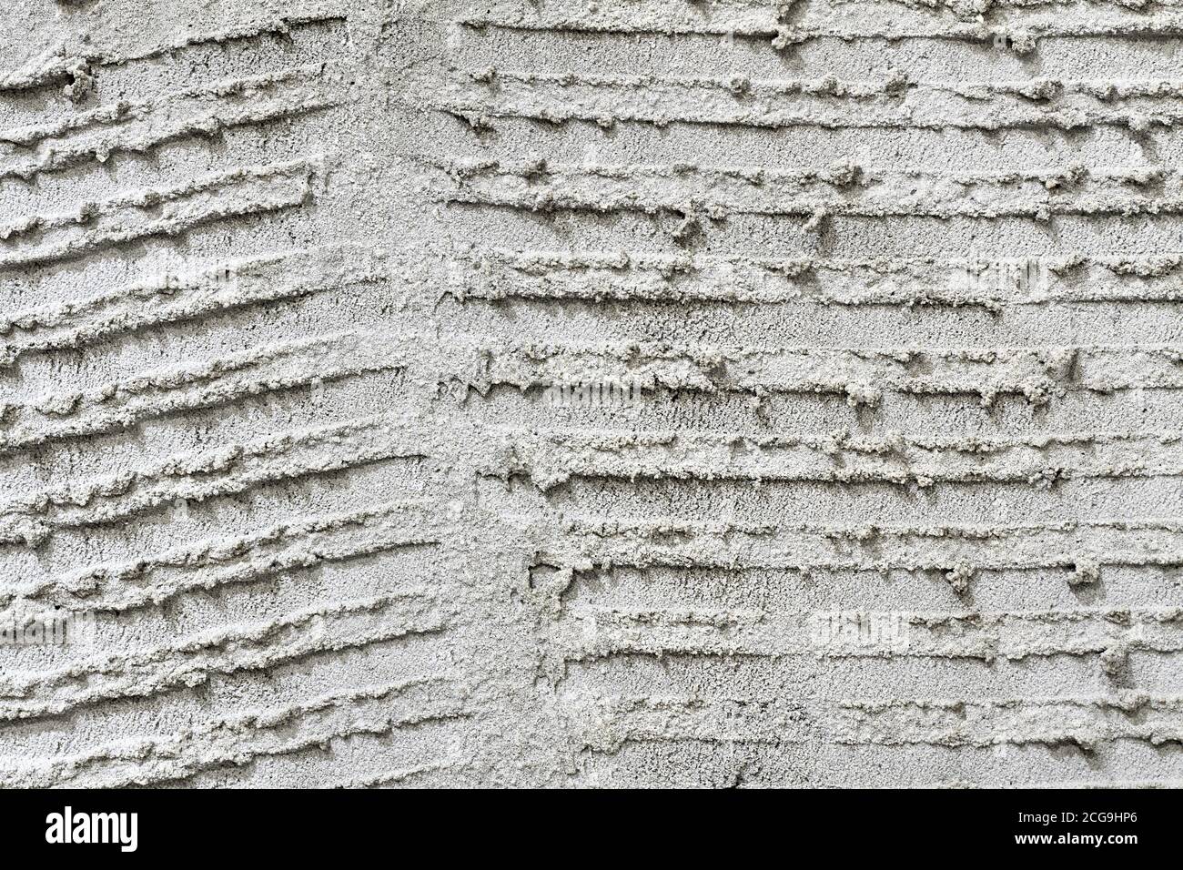 Rough grooved gray textured cement wall with pattern prepared for ...