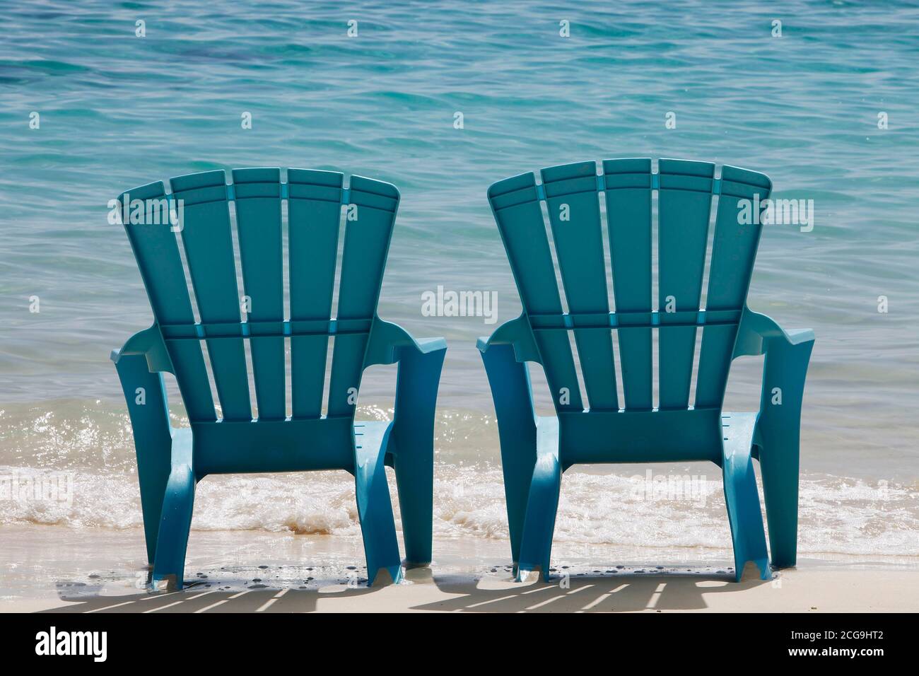 Blue Beach Chairs, Cat Island in Bahamas Stock Photo - Alamy
