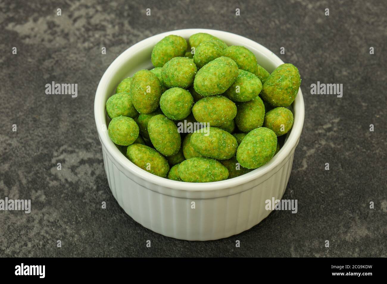 Spicy wasabi peanuts snack in the bowl Stock Photo - Alamy