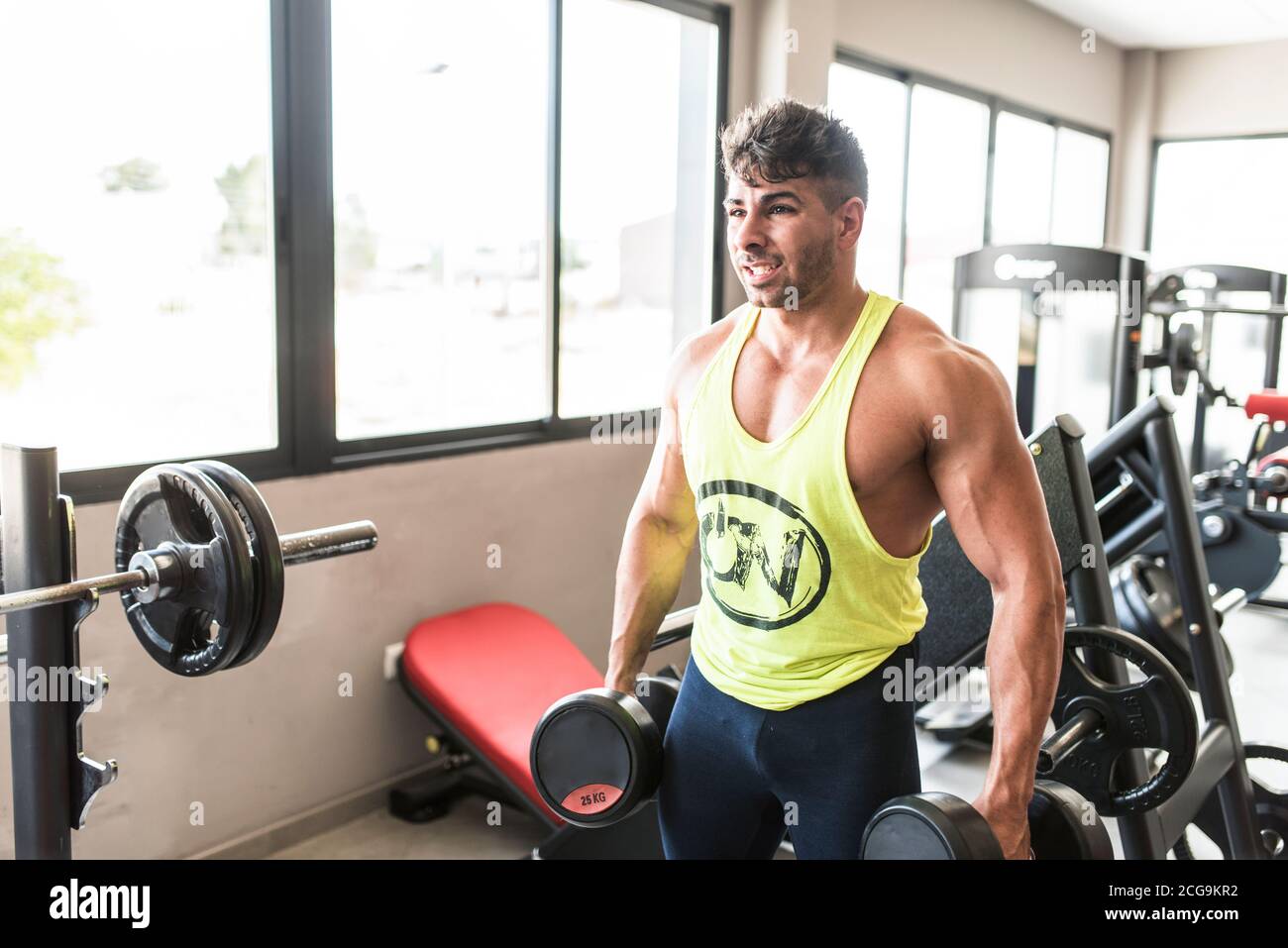 Man lifting weights in gym hi-res stock photography and images - Alamy