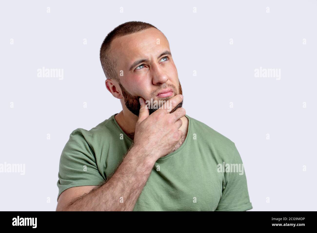 Doubting young man close up hi-res stock photography and images - Alamy