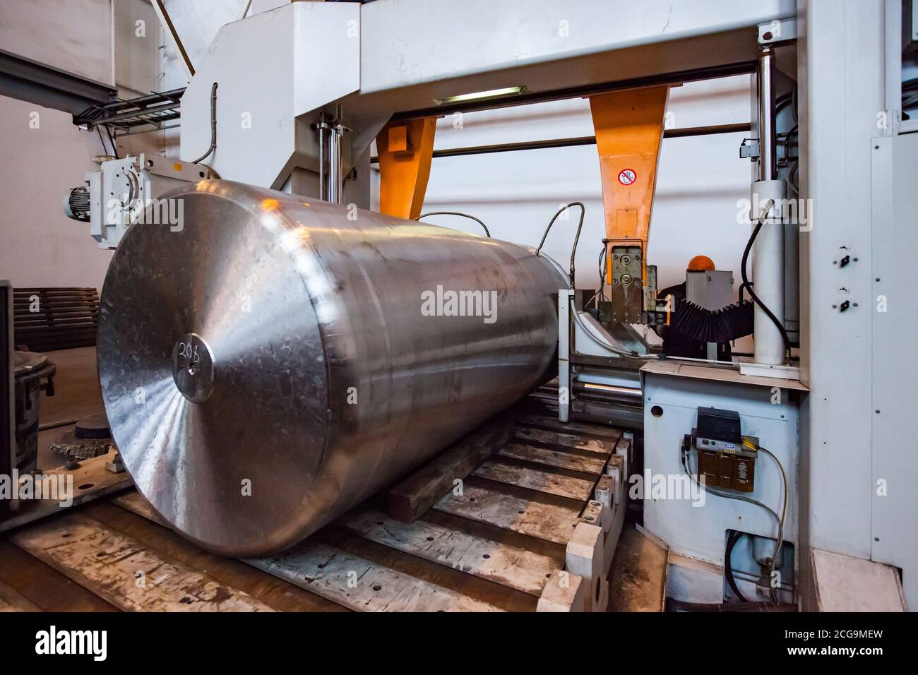 Titanium cylinder rod after mechanical metal work on turning lathe ...