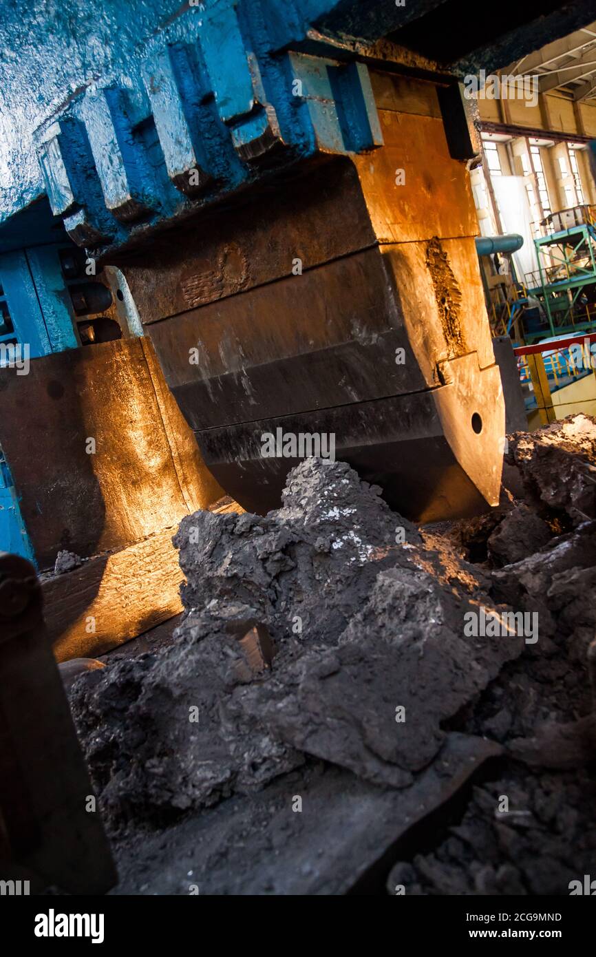 Titanium metal sponge crusher. Titanium metallurgy plant. Close-up ...