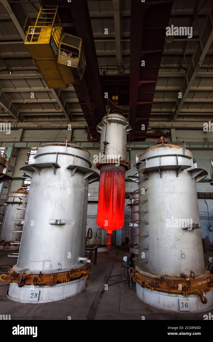 Melting metal titanium in vacuum furnace. Metallurgy factory workshop ...