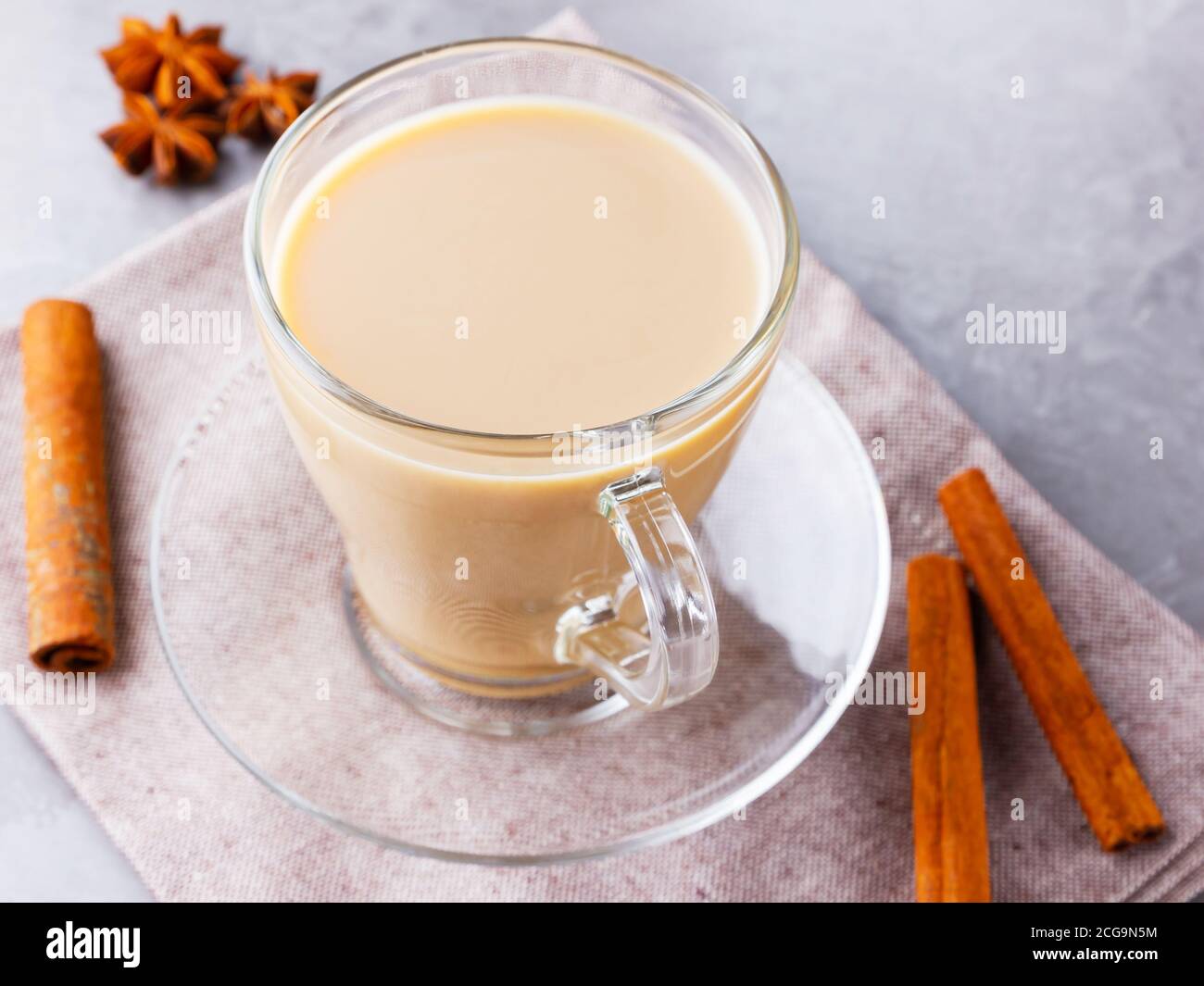 Masala chai tea. Traditional indian drink - masala tea with spices on ...