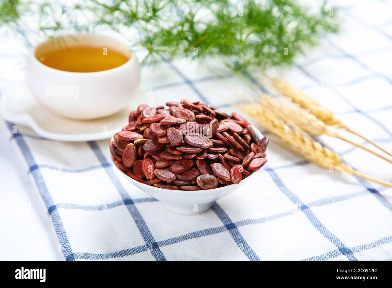 Red melon seeds Stock Photo - Alamy